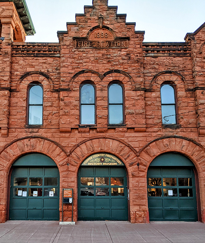 The 1898 Red Jacket Fire Station now houses history behind those magnificent arched doors, where horse-drawn pumpers once rushed to save the town.