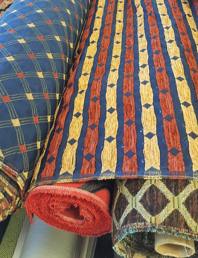 Rich textures and bold patterns create a tactile playground where your fingers can't help but reach out for "just one more feel."