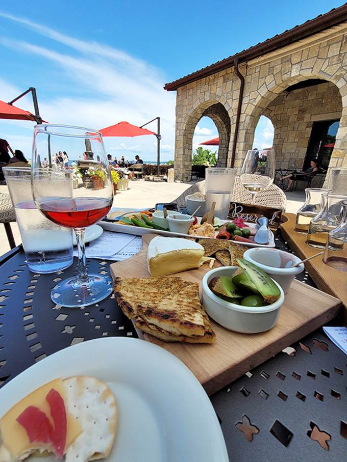 Al fresco dining reaches new heights when paired with vineyard views and exceptional wines, transforming a simple lunch into a Mediterranean-inspired Michigan memory.