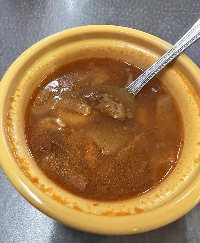 Portuguese bean soup &ndash; a hearty island tradition with chunks of lingui&ccedil;a sausage swimming alongside tender beans in rich, savory broth.
