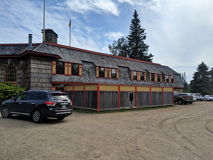 Weather-worn cedar shingles tell stories of decades facing Lake Superior's moods, while distinctive red trim brightens even the grayest Minnesota day.