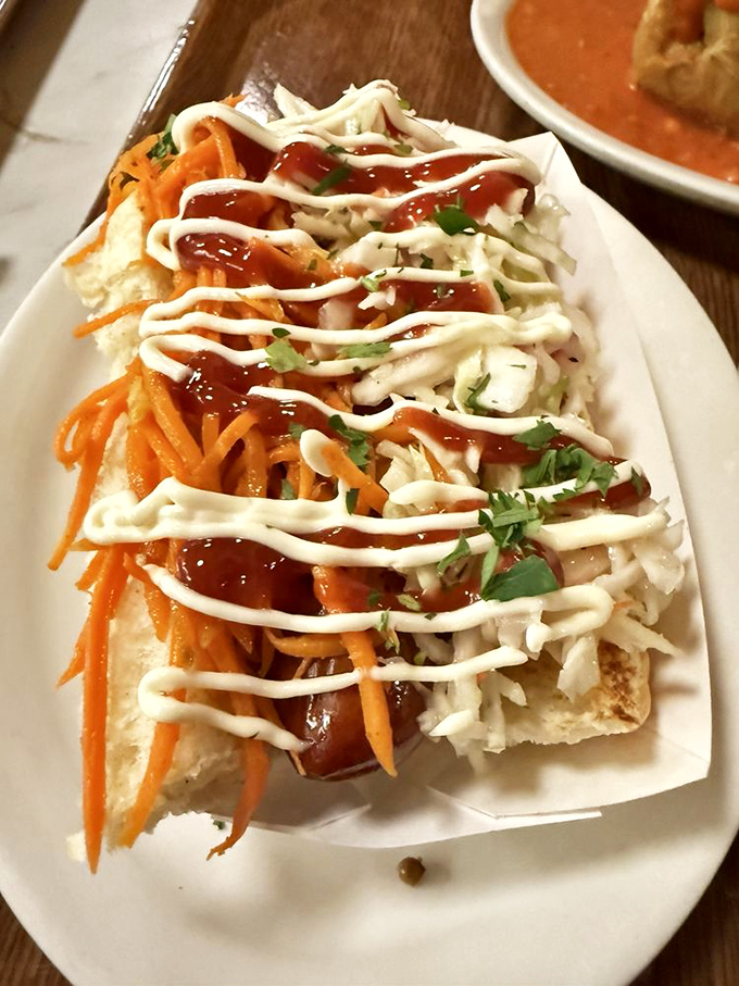 The Ukrainian-style hot dog &ndash; what regular hot dogs dream of becoming when they grow up. Garlicky sausage nestled in fresh-baked bread with all the fixings.