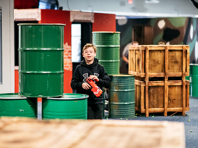 Young competitors discover their inner strategists, proving that video game skills sometimes translate surprisingly well to real-world foam warfare.