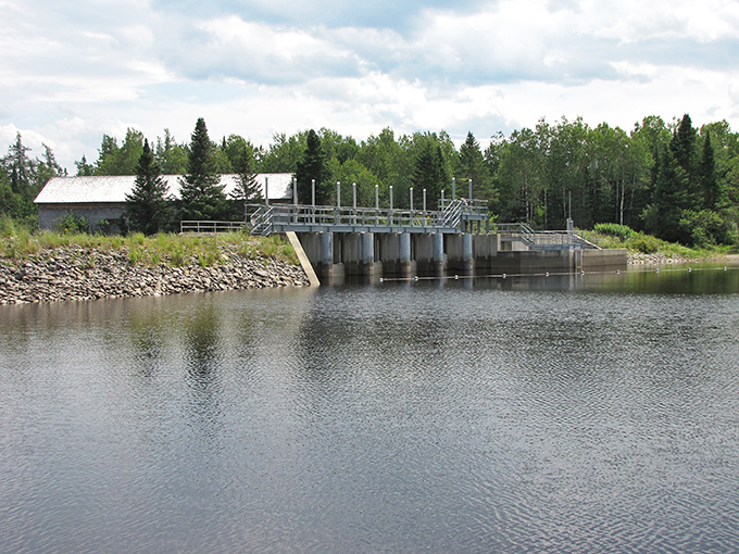 Engineering meets wilderness at this dam, where human ingenuity harnesses the power of Maine's waters while blending into the natural landscape.