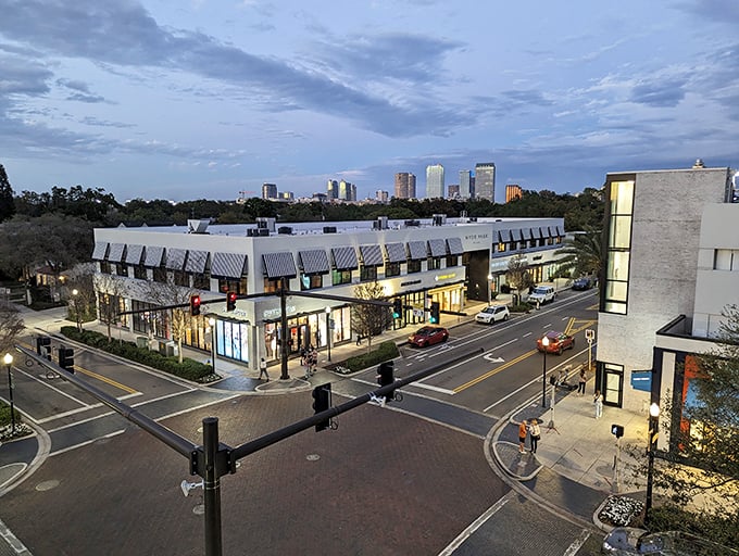 As twilight descends, Hyde Park Village transforms under twinkling lights, creating a magical atmosphere where dinner reservations suddenly feel like tickets to something special.