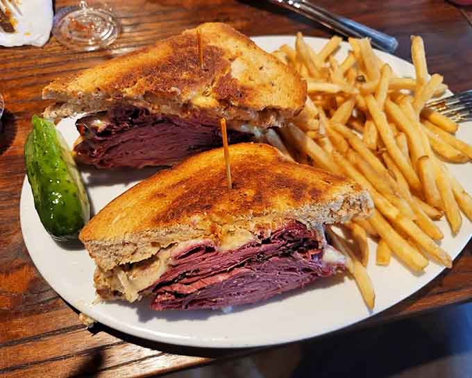 The Reuben sandwich towers with corned beef and melted Swiss, looking like it escaped from a New York deli and landed in Florida.