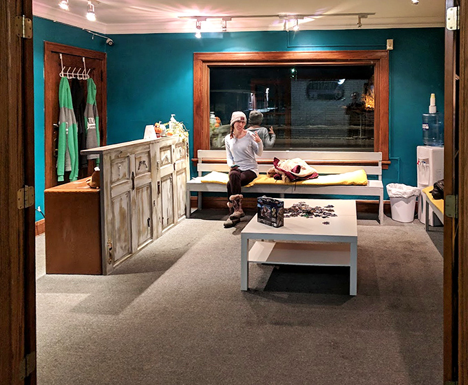 The welcoming lobby area provides a comfortable space for teams to gather their thoughts before embarking on their magical puzzle-solving quest.