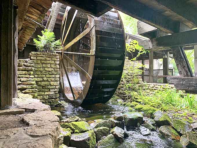 The gentle rhythm of this working water wheel transports visitors to a simpler time, when water power turned grain into daily bread.