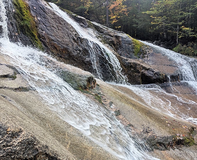 Screw Auger Falls carved its signature spiral patterns over millennia, the water drilling perfect circular pools into solid Maine bedrock.