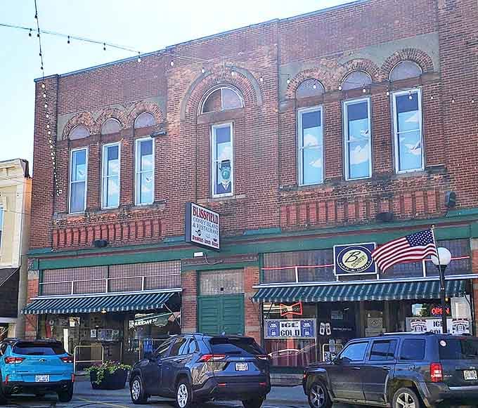 The historic Blissfield Coney Island building stands proudly on the corner, its classic architecture housing comfort food that locals swear by.