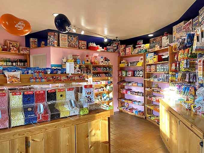 The candy shop's rainbow of sweet temptations proves that some childhood pleasures never lose their appeal, regardless of your age.