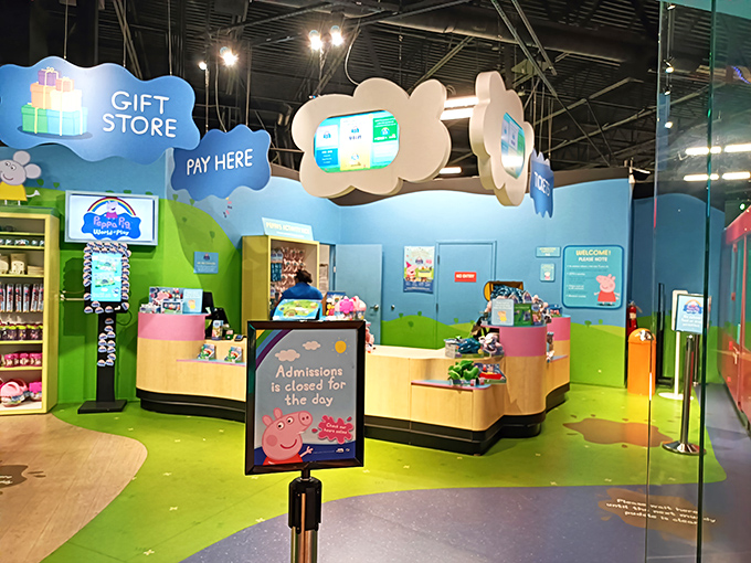 The entrance counter: your gateway to organized chaos and the last checkpoint before surrendering to two hours of animated bliss.