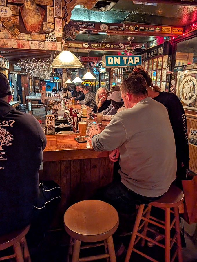 The bar area buzzes with conversation as patrons debate important life questions like "Another round?" (The answer is always yes).