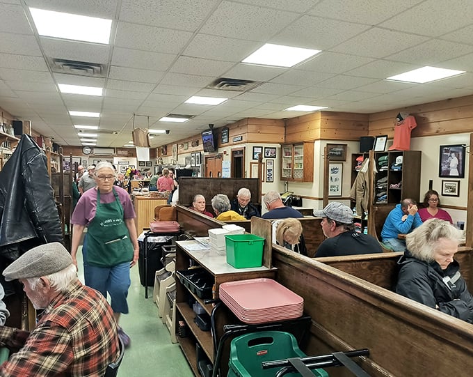 Regulars and first-timers share space in the dining room, where conversations flow as freely as the coffee refills.