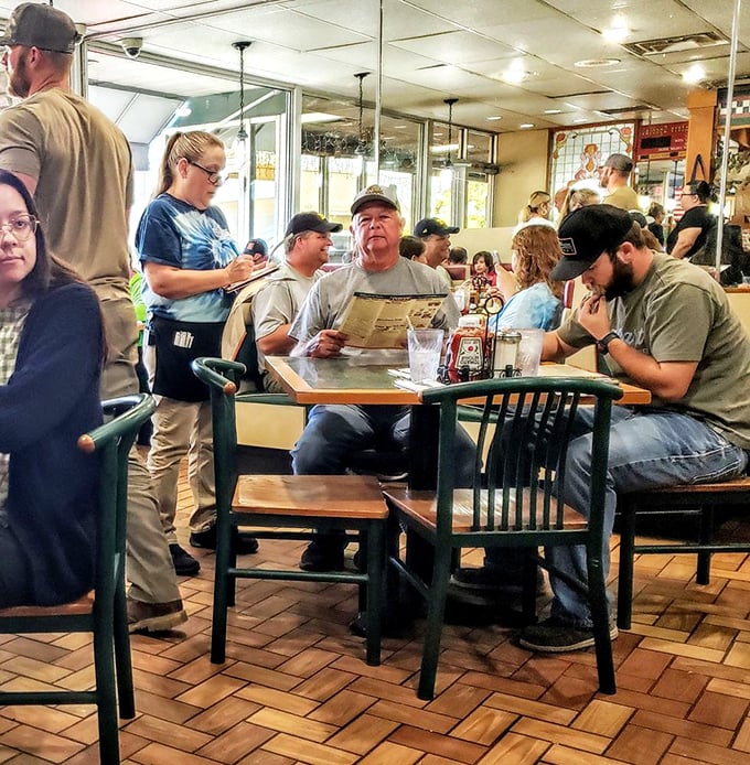 The bustling dining room hums with conversation, laughter, and the occasional "Oh my goodness!" when plates arrive at neighboring tables.