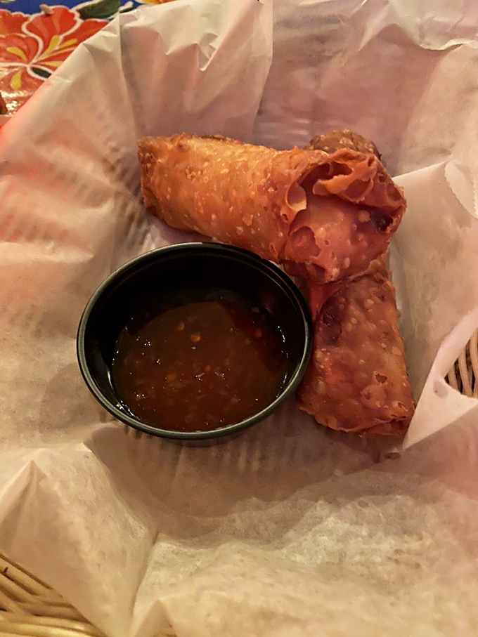 Egg rolls that shatter with each bite, revealing a filling worth fighting over &ndash; sharing is technically optional here.