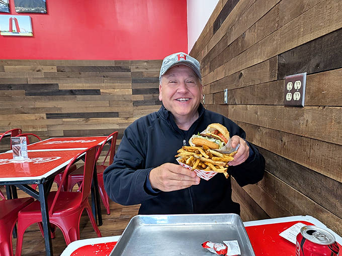 Diner: That look of pure joy says it all—the first bite of an El Gordo burger creates instant converts to the church of Mexican-American fusion.