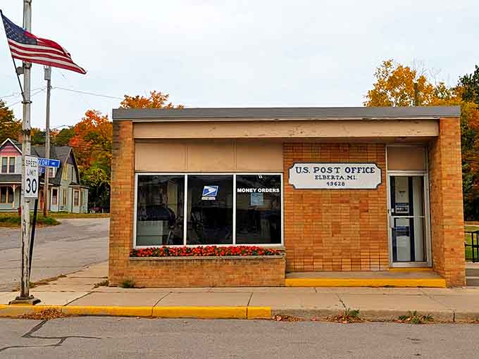 Elberta's post office serves as the town's beating heart, where locals gather to exchange news as reliably as they collect mail.
