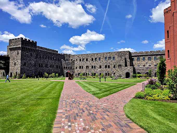 Manicured lawns and brick pathways connect the various themed buildings, turning a simple walk to your next meeting into a journey through different worlds.