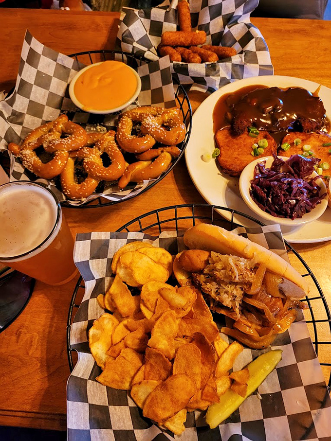 A German feast fit for royalty &ndash; pretzels, potato pancakes, and schnitzel sharing a table with red cabbage and savory sauces.