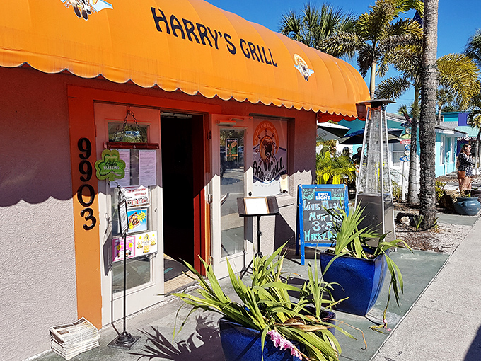 Harry's Grill, where the orange awning signals burgers that make fast-food chains seem like sad imitations.