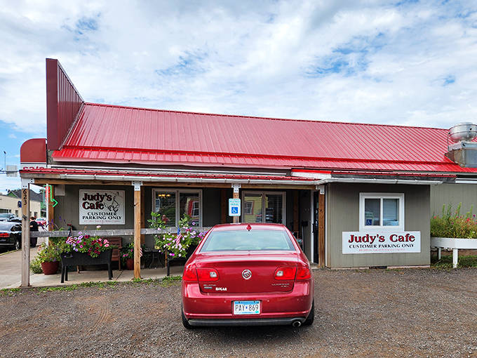 Judy's Caf&eacute; iconic roadside building beckons travelers with its cheerful red roof, promising sweet rewards for those wise enough to stop.