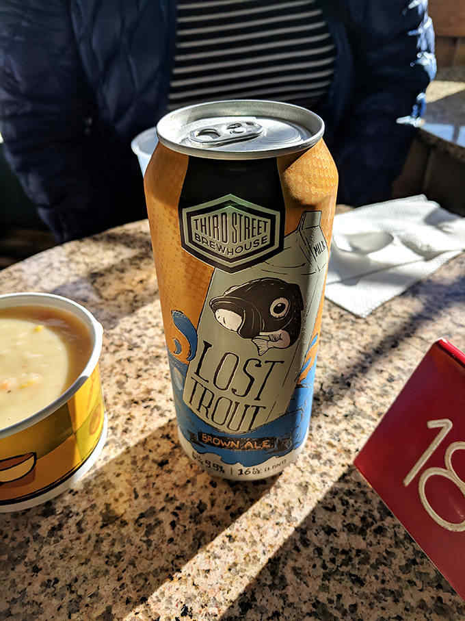 Local craft beer, like this Lost Trout Brown Ale, provides the perfect companion to seafood, its malty notes complementing the lake's fresh flavors.