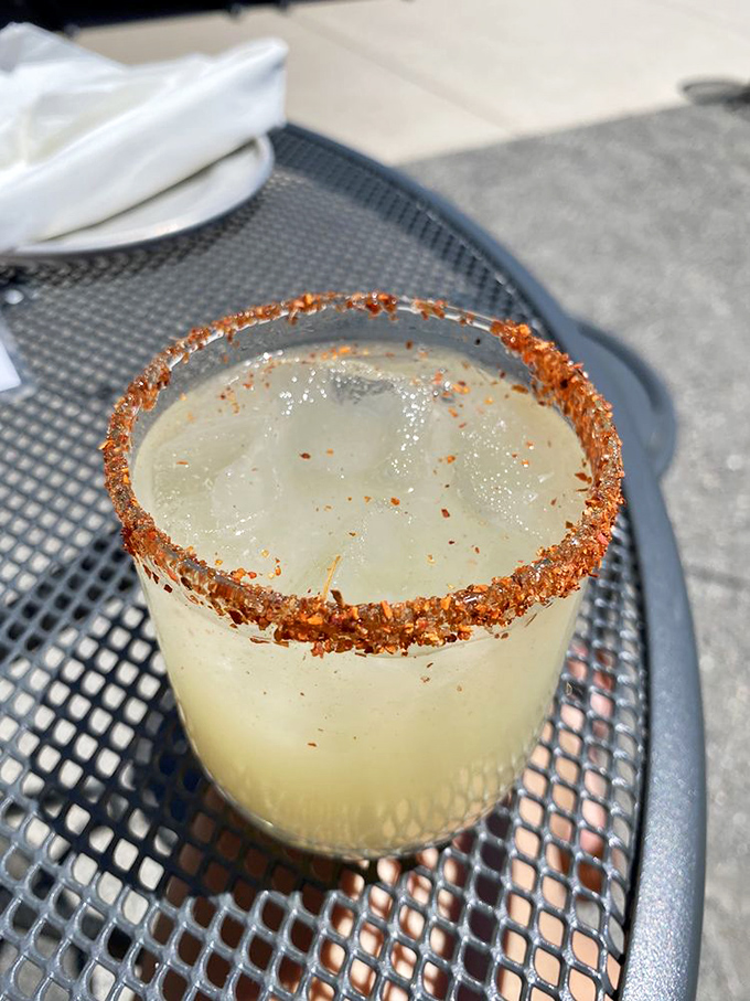 This isn't just any margarita &ndash; it's a smoky mezcal masterpiece with a spicy rim that keeps you coming back for "just one more sip."