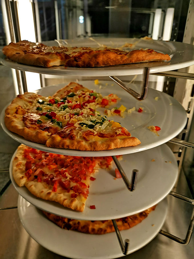 Pizza that's been to finishing school – perfectly crisp, delightfully topped, and far too dignified to be eaten folded in half while standing.