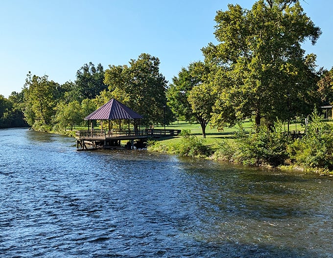 Riverside Park's peaceful gazebo extends over the Huron River, offering a perfect spot for contemplation or watching the water flow by.