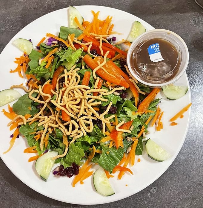 A salad that doesn't apologize for being healthy&mdash;crisp, colorful, and topped with crunchy noodles that make eating vegetables feel like cheating.