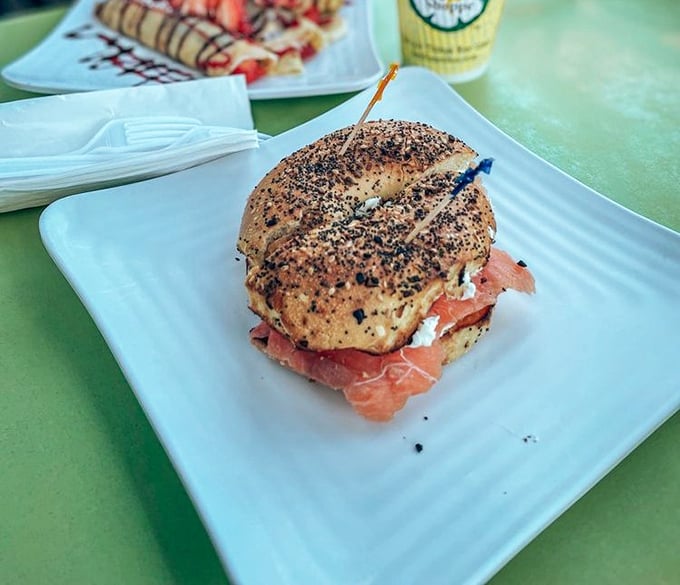 The breakfast of champions &ndash; a perfectly toasted bagel embracing cream cheese and salmon in a morning love affair.