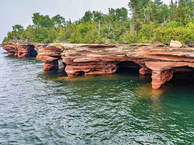 Nature's sculptural genius reveals itself in the sea caves of Devil's Island, where Lake Superior has carved masterpieces from stone.
