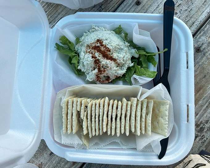 Creamy smoked fish dip with crackers – the appetizer so good you'll be tempted to cancel your entrée and order another round.