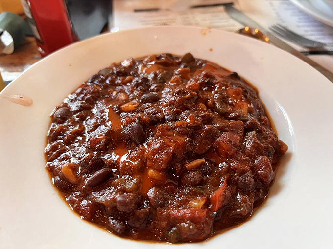 Hearty vegan chili that doesn't sacrifice an ounce of flavor &ndash; a rich, spiced tomato base loaded with beans and vegetables.