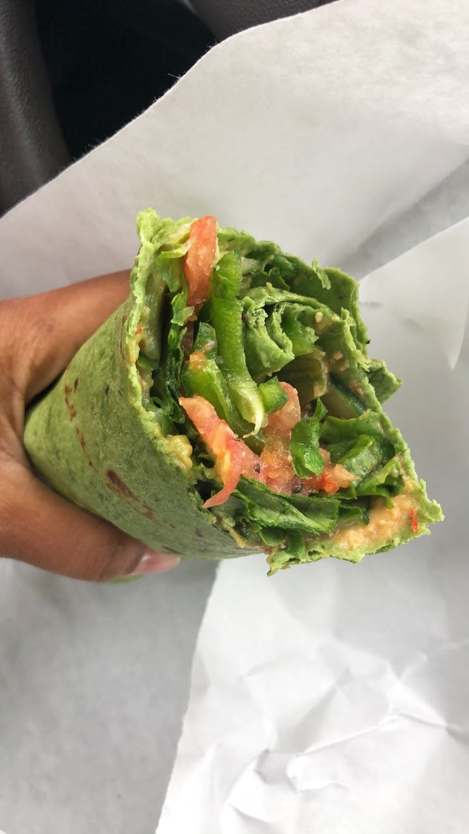 Vegetable wrap brilliance: A garden party wrapped in a tortilla, where avocado and fresh veggies prove that meatless options can steal the spotlight.