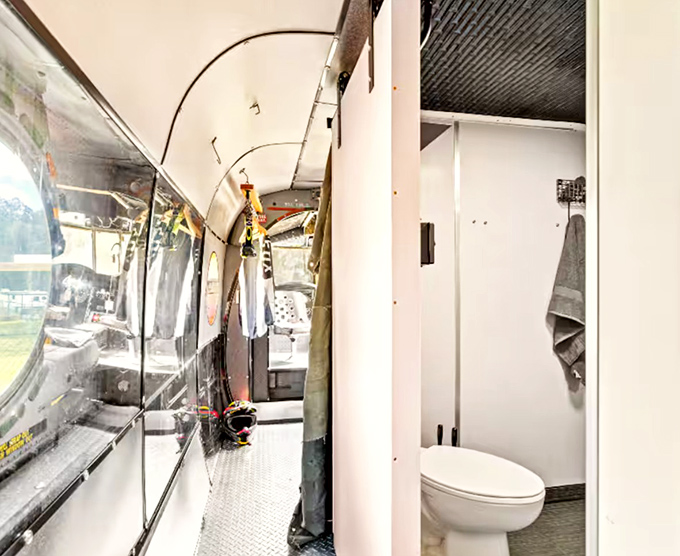 Even helicopters need bathrooms! This compact space proves military conversions can include all the necessary comforts of home.