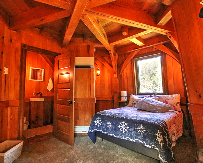 The bedroom combines maritime charm with cozy comfort &ndash; dream of ocean voyages while nestled in Minnesota's heartland.