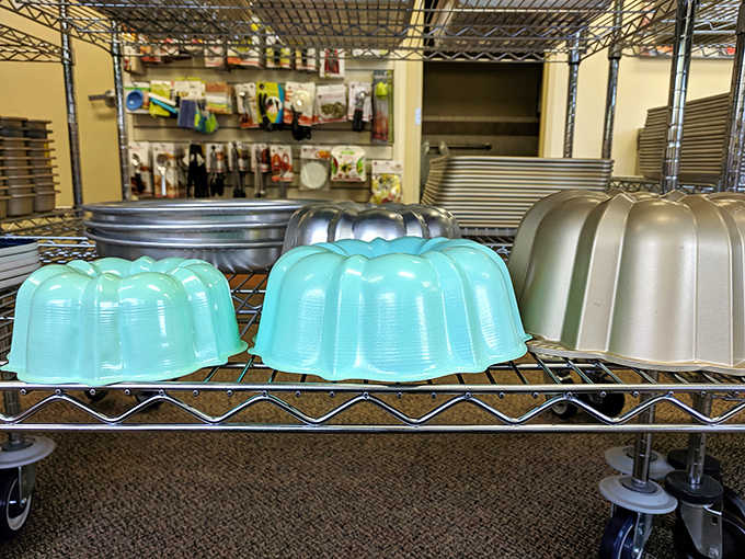 The tools behind the magic. These colorful molds stand ready to transform ordinary batter into conversation-starting desserts at your next gathering.