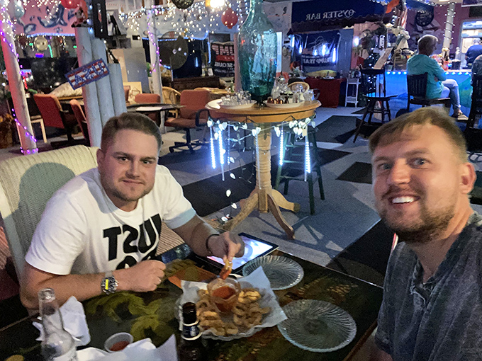 Happy diners enjoying the fruits of the sea &ndash; at Moorings, every meal feels like a celebration with friends you haven't met yet.