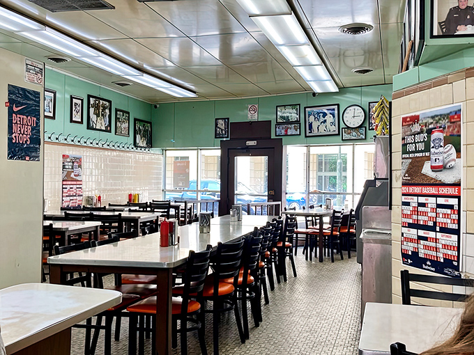 The simple dining room where Detroiters from all walks of life gather to worship at the altar of the coney dog.