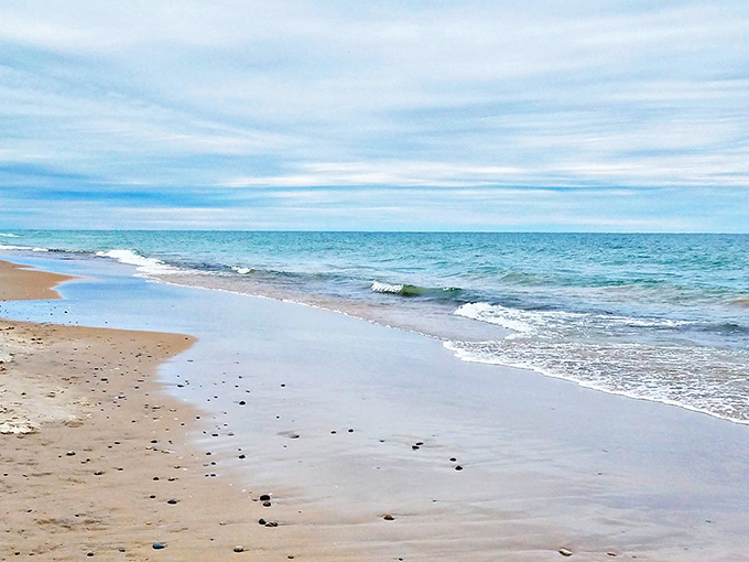 Tiny treasures hide in plain sight along the shoreline, where fragments of history transform into colorful, wave-polished gems.
