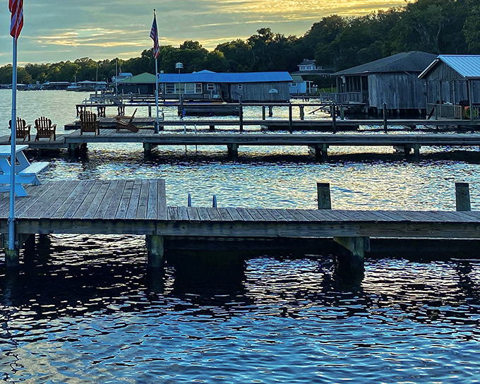 Wooden docks create a rhythm along the shoreline, each one a stage for countless family memories.