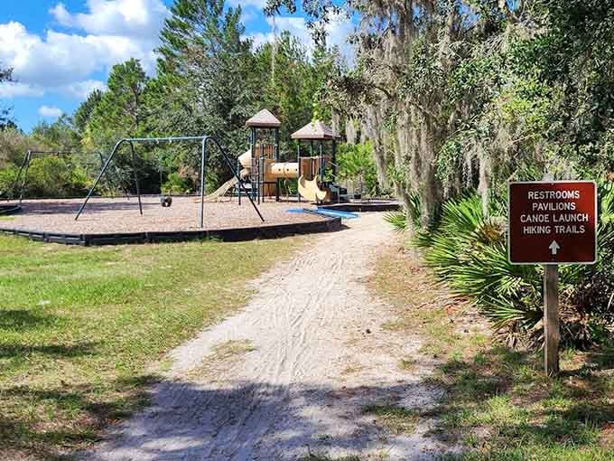 The playground blends seamlessly with natural surroundings, giving kids a place to burn energy while parents catch their breath.