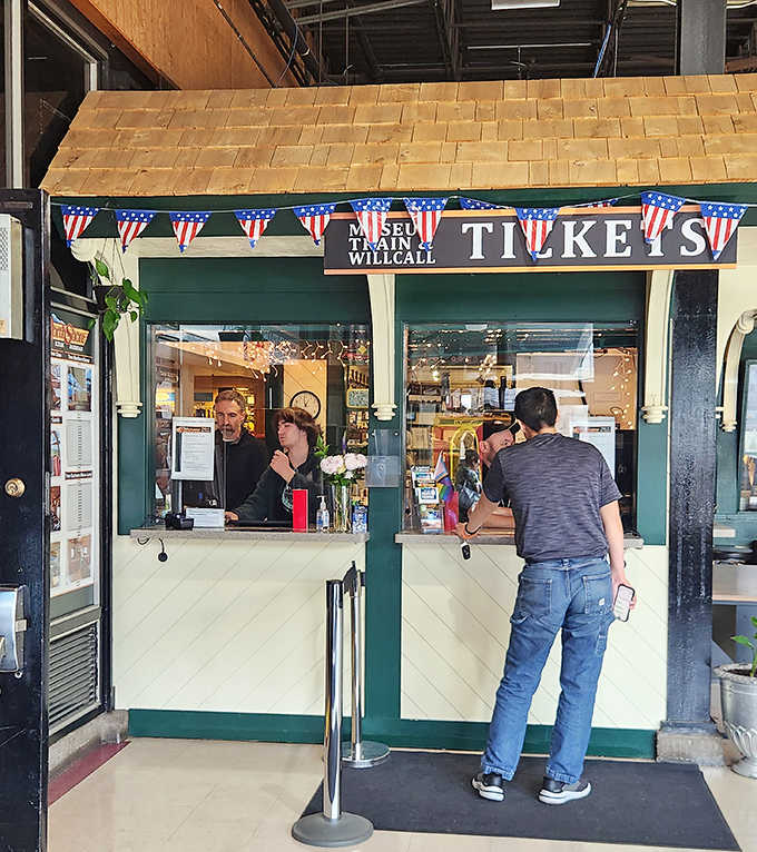 "Tickets, please!" The charming booth transports visitors to rail travel's golden age before their journey even begins.