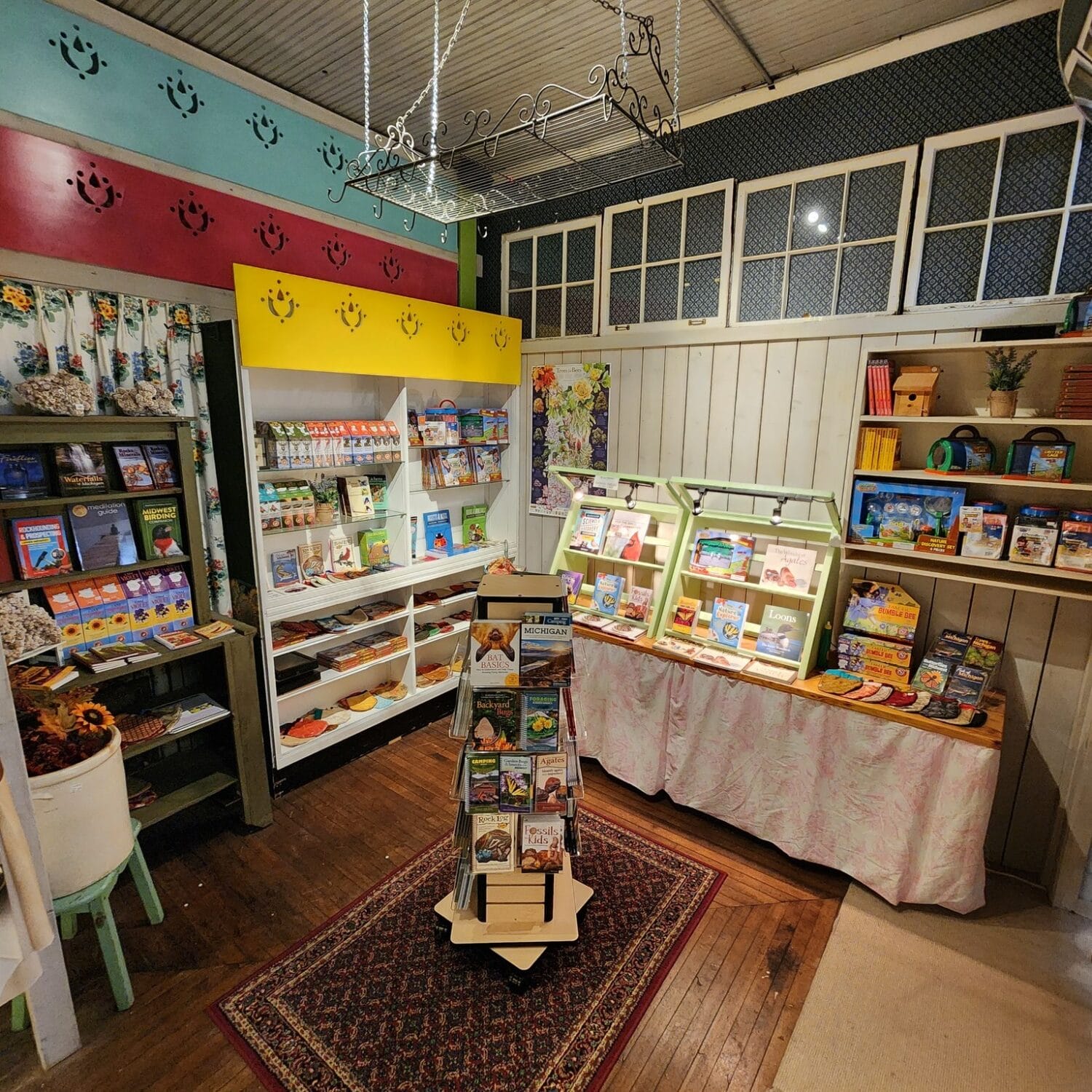 a corner inside the store where book and magazines are displayed