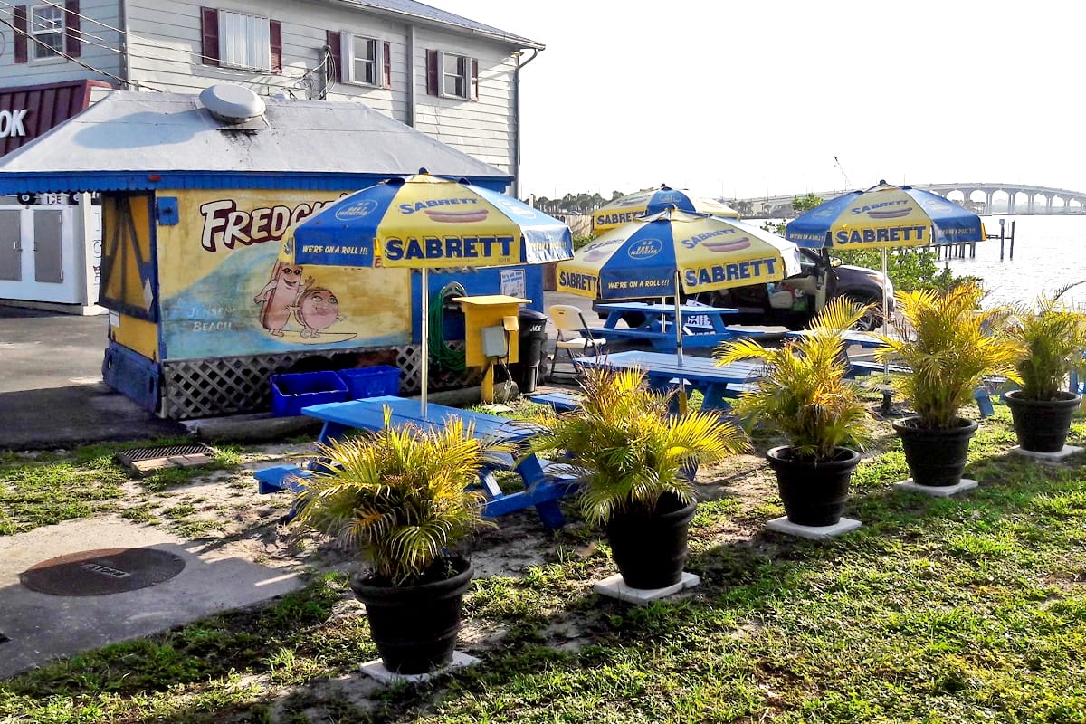a lovely shot of the hotdog shop overlooking a river