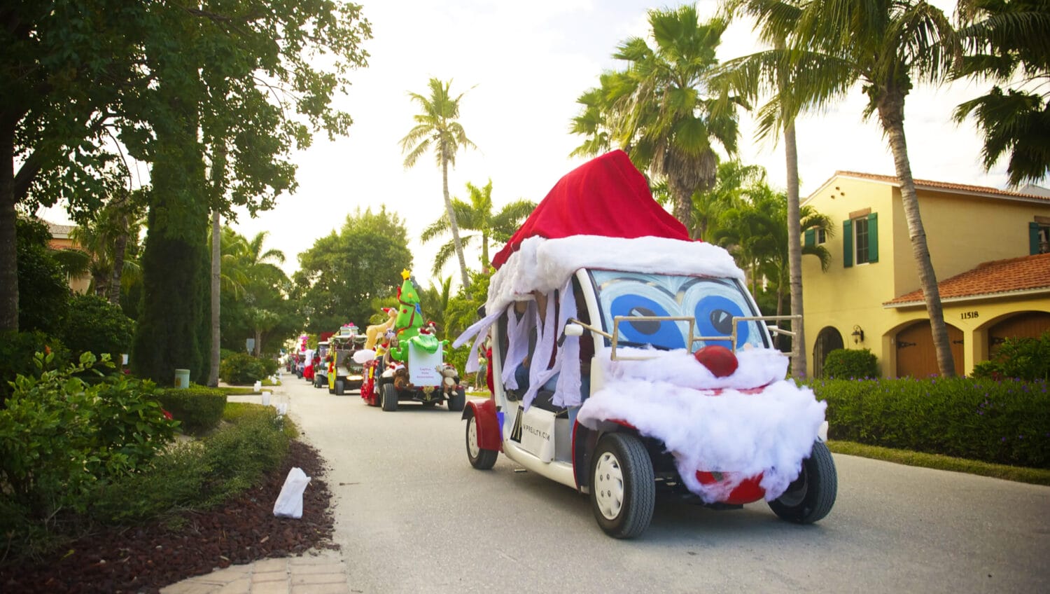 A parade of decorated carts by South Seas Resort