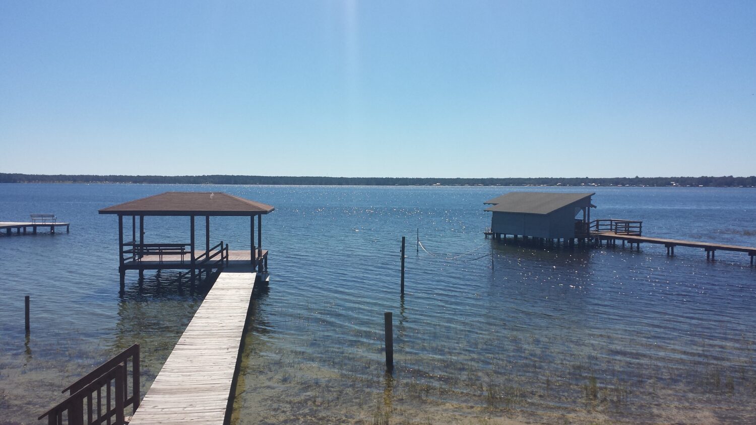 a view of the kingsley lake with boardwalks and observation point
