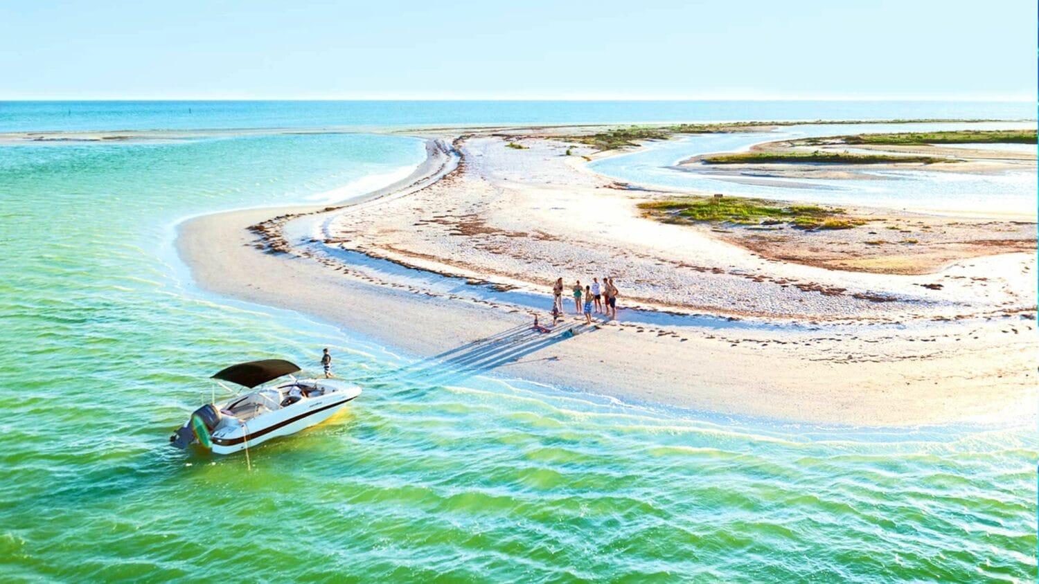 An aerial view of the beach from a group of tourist enjoying the beach for themselves